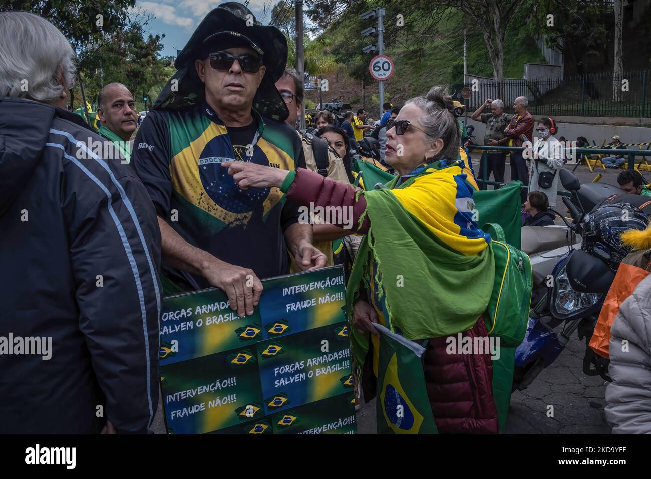 Supporters of the far-right Brazilian president Jair Bolsonaro argue ...