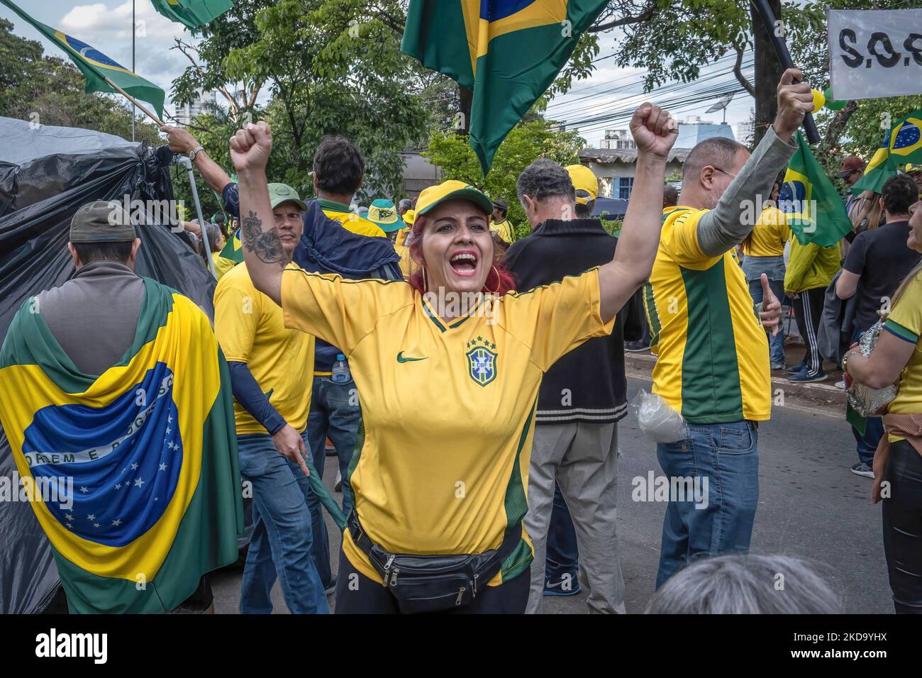 A supporter of the far-right Brazilian president Jair Bolsonaro shouts ...