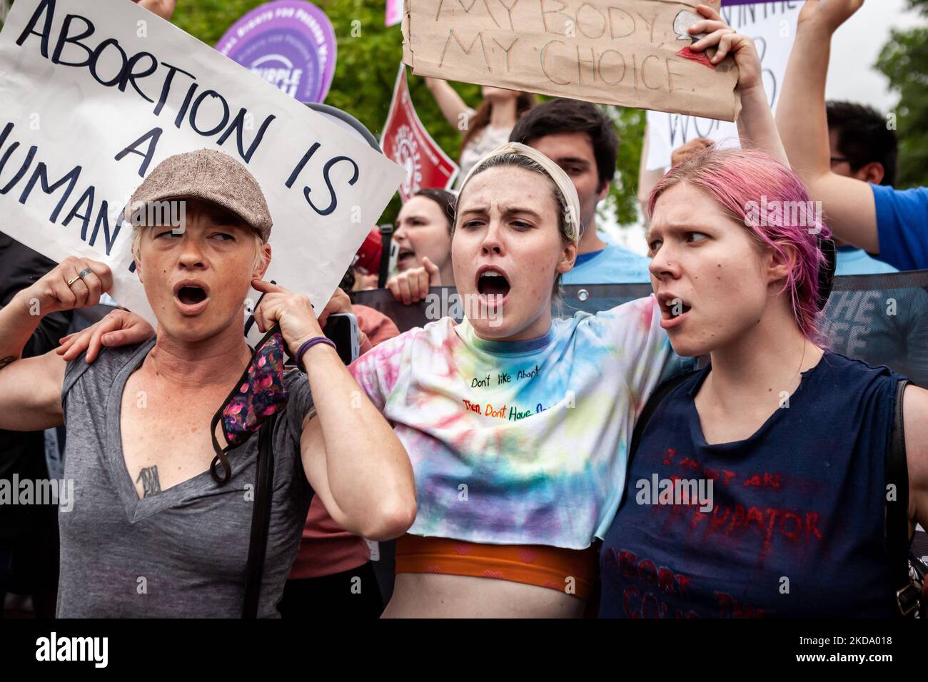 March participants try to drown out pro-life counter-protesters during ...