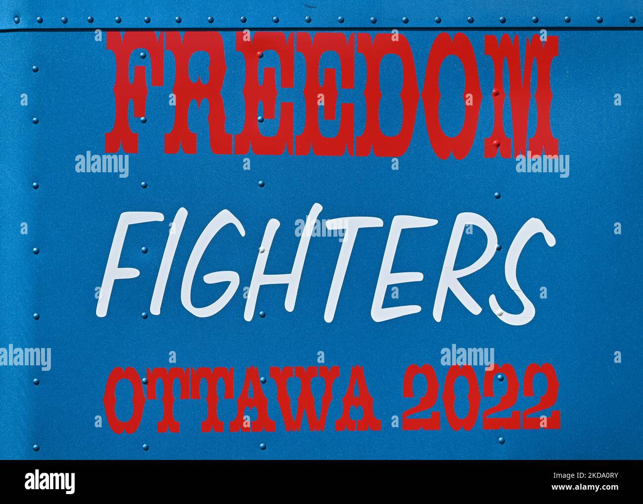 An inscription 'Freedom Fighters Ottawa 2022' seen on a truck ...