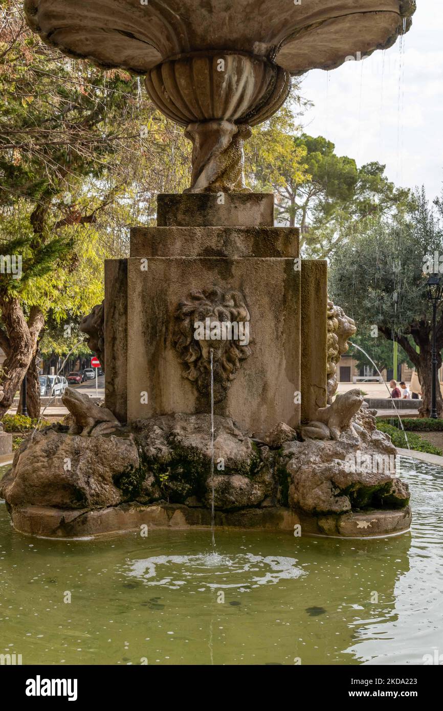 Fountain in the Majorcan city of Inca, with reliefs of lion faces ...