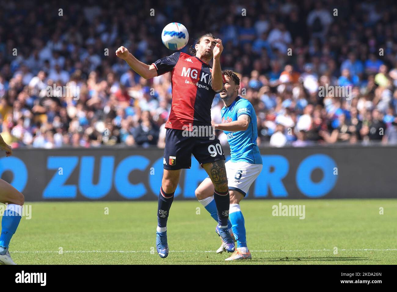 Manolo Portanova of Genoa CFC competes for the ball with Mario Rui of ...