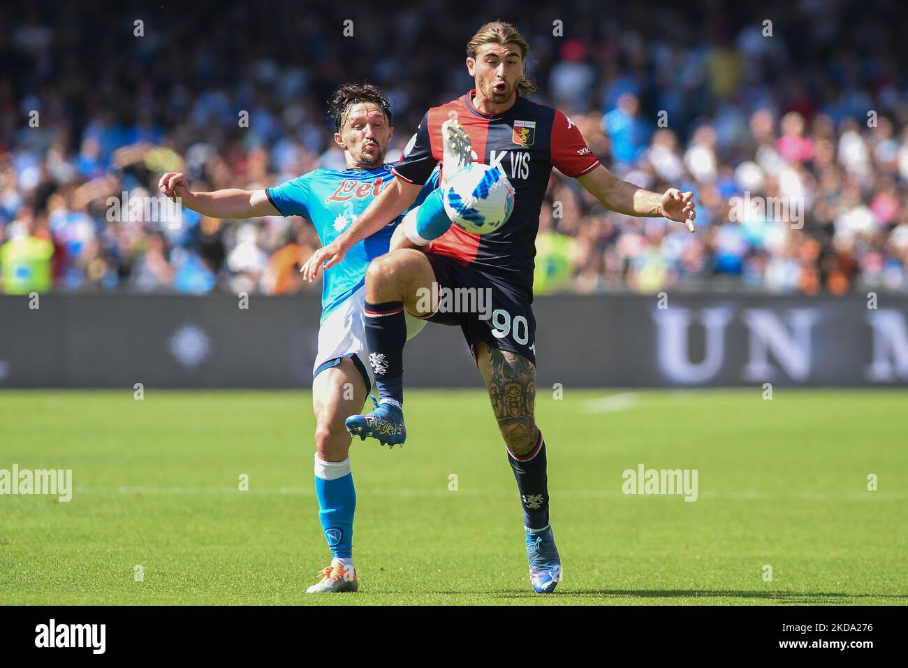 Manolo Portanova of Genoa CFC competes for the ball with Mario Rui of ...