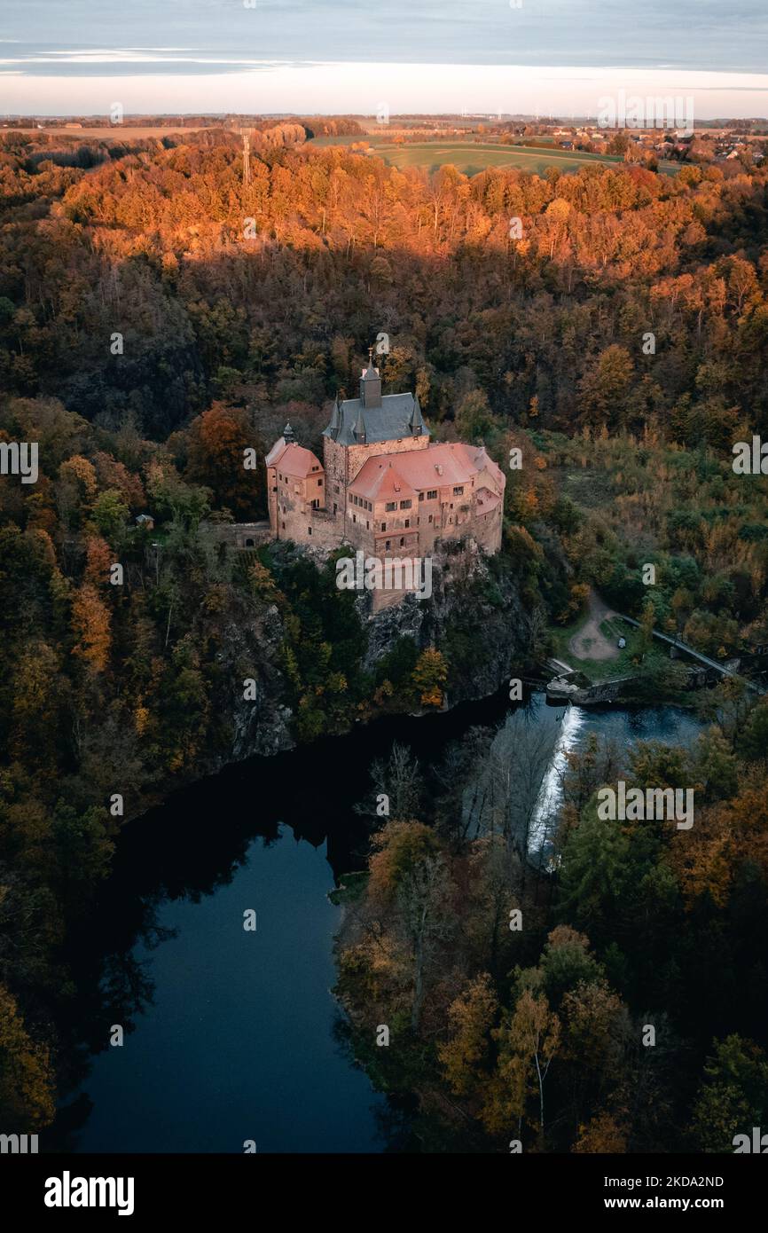 A bird's eye view of Kriebstein Castle on bank of Zschopau river in ...