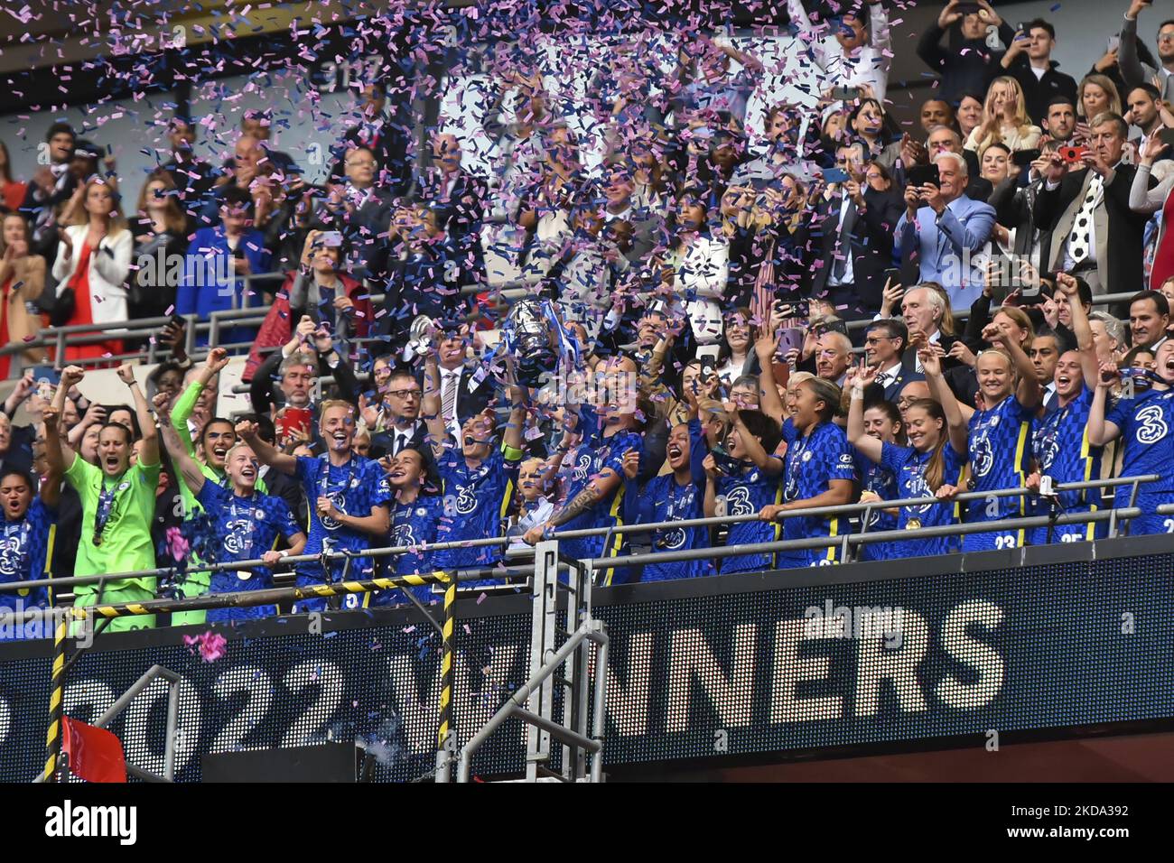 Chelsea players lifting the FA Cup trophy after the Women's FA Cup ...