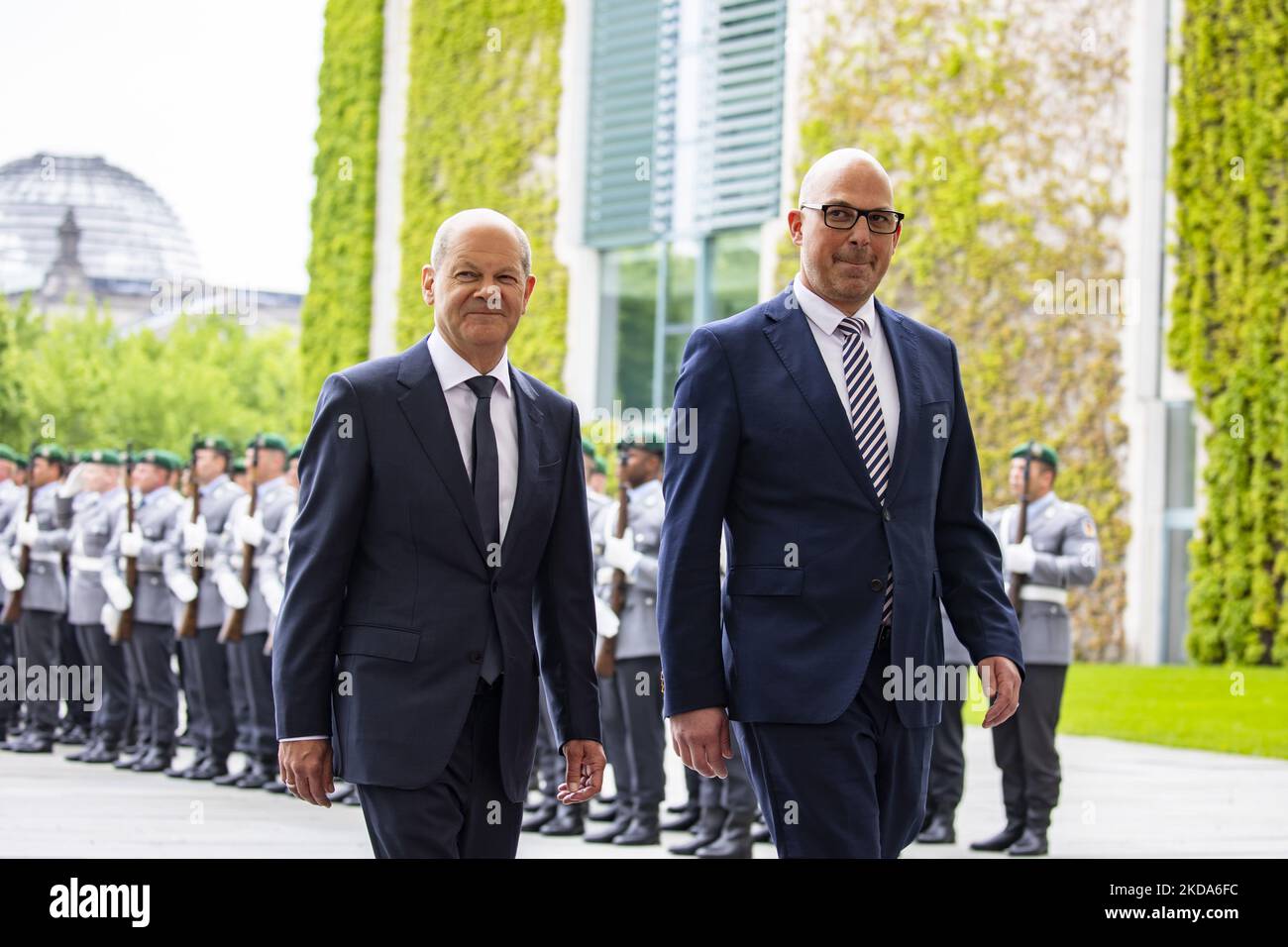 German Chancellor Olaf Scholz (L) receives Prime Minister of ...