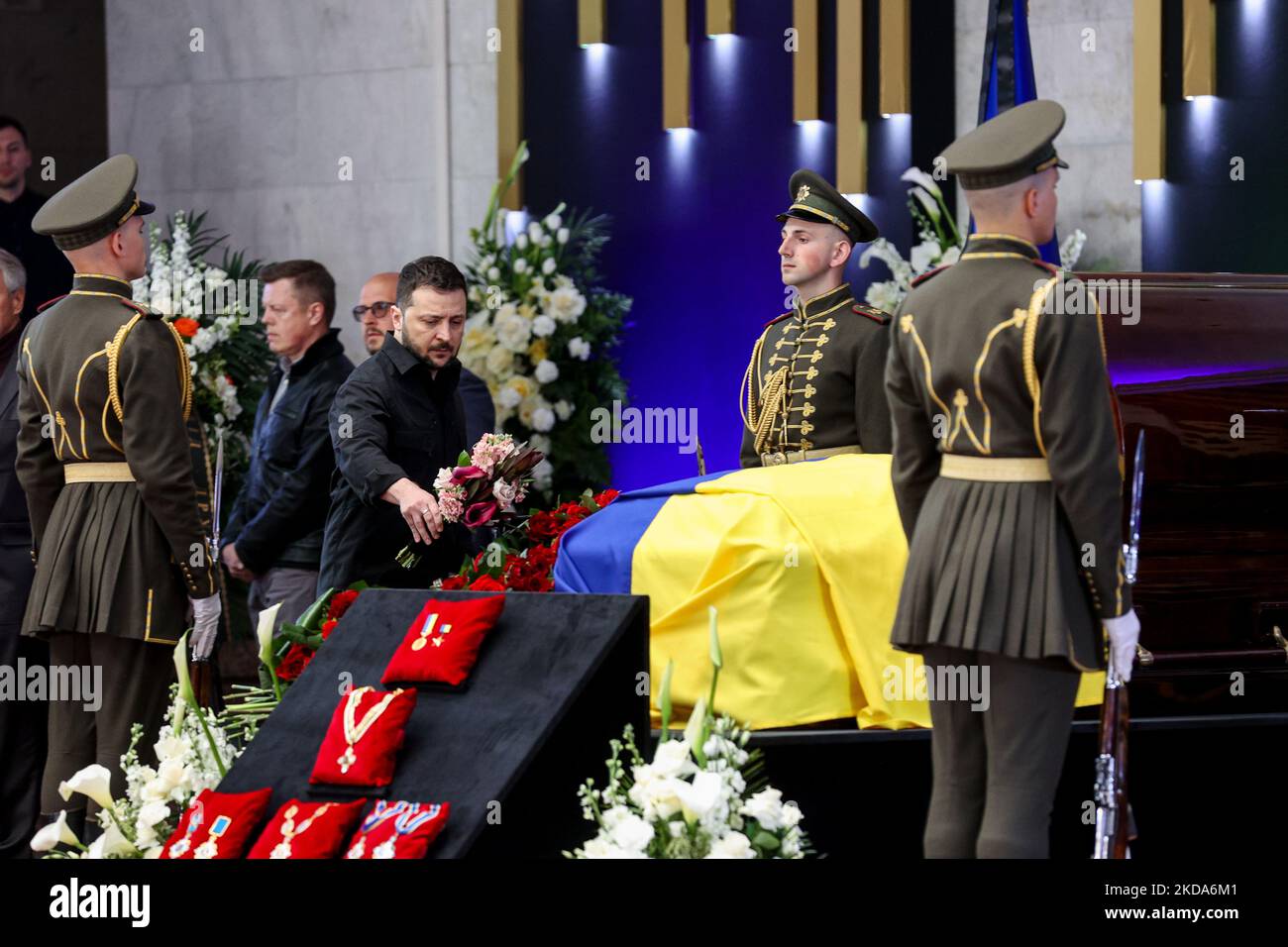President of Ukraine Volodymyr Zelensky lays flowers near the coffin ...