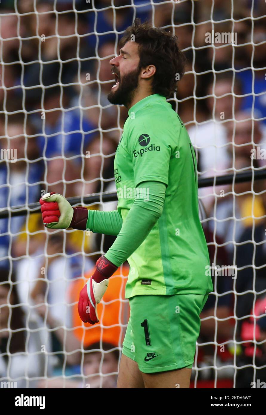 Liverpool's Alisson Becker celebrates after save from Chelsea's Mason ...