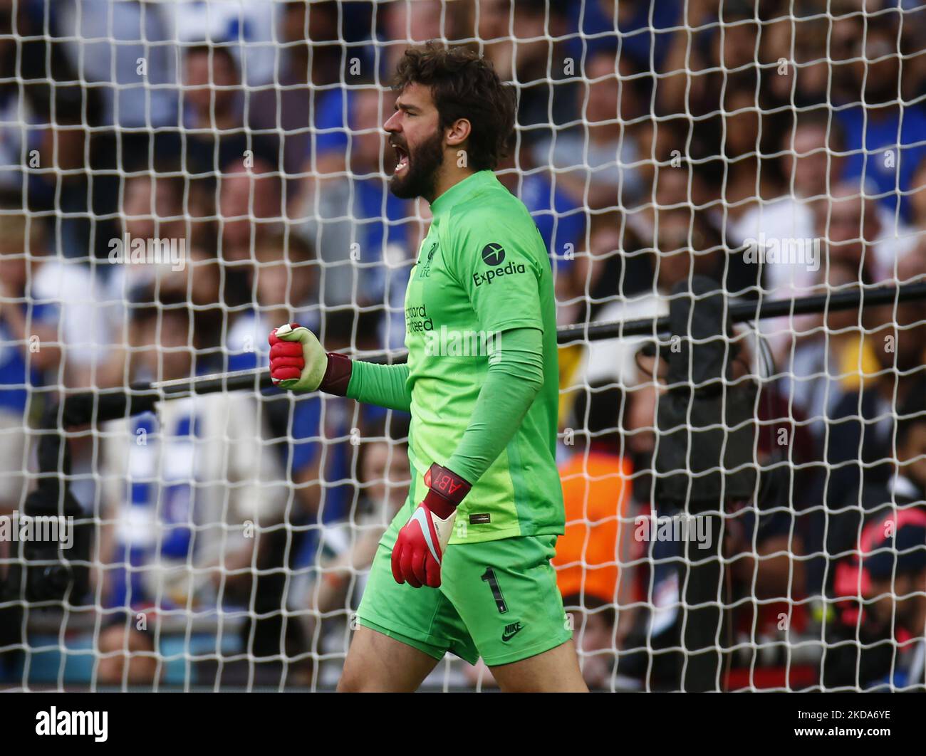 Liverpool's Alisson Becker celebrates after save from Chelsea's Mason ...