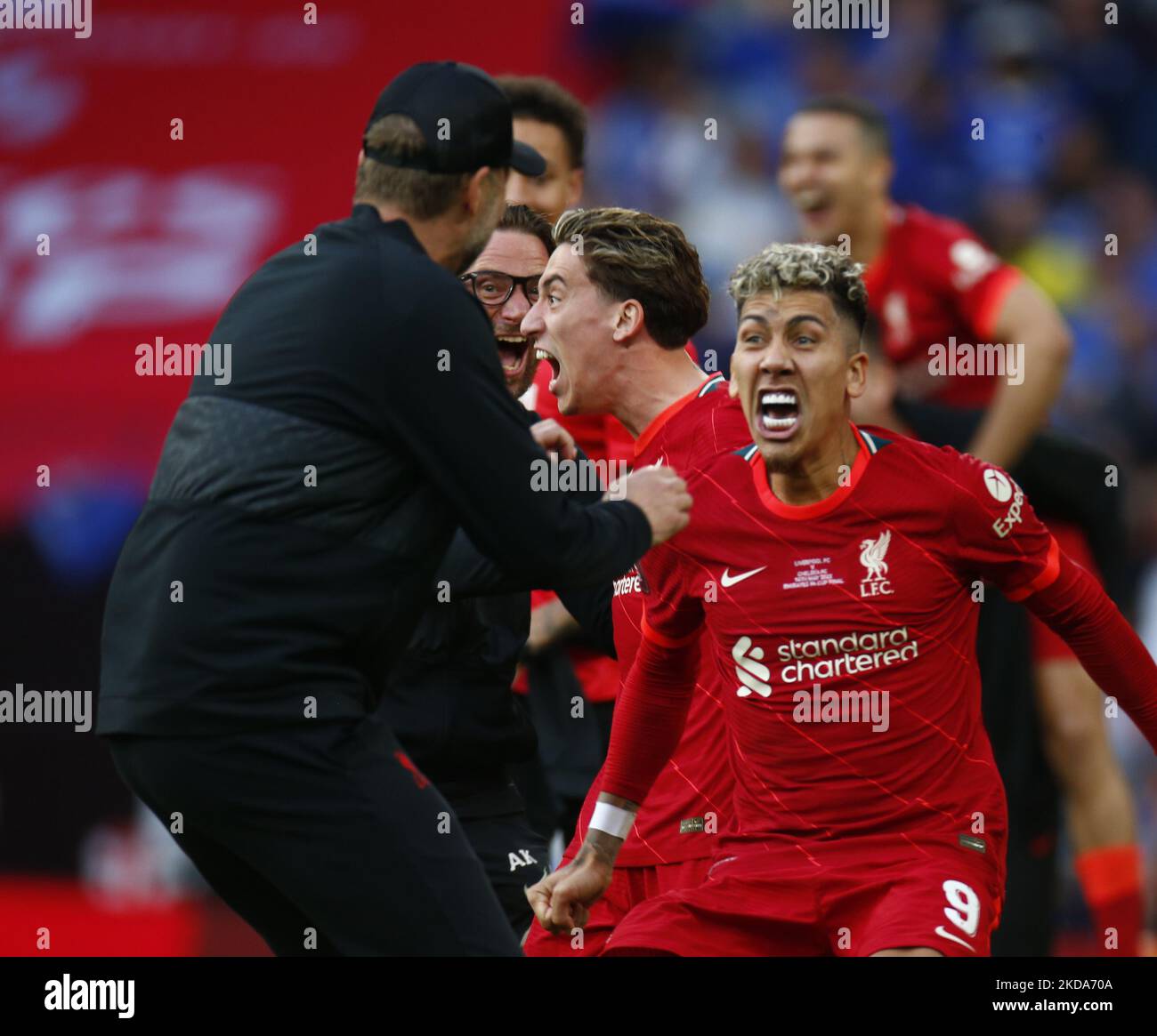 Liverpool's Roberto Firmino celebrates after Liverpool's Kostas ...