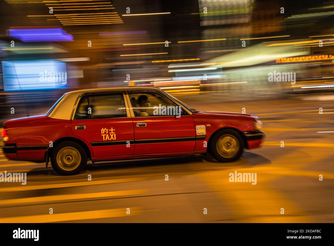 Hong Kong, China, 19 May 2022, A taxi drives by in Central Hong Kong ...
