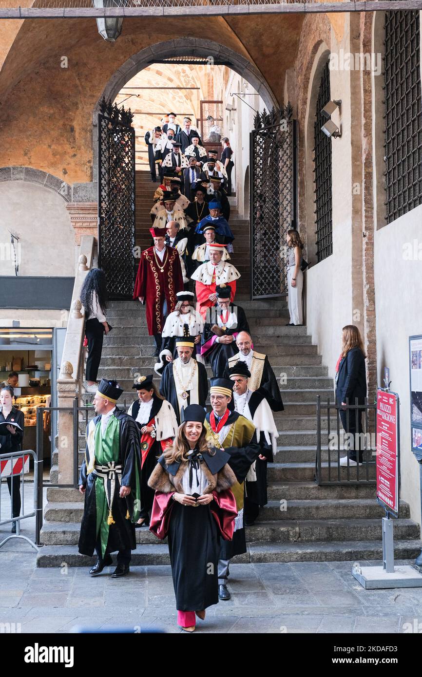 professors with historical clothes parade through the streets of the ...