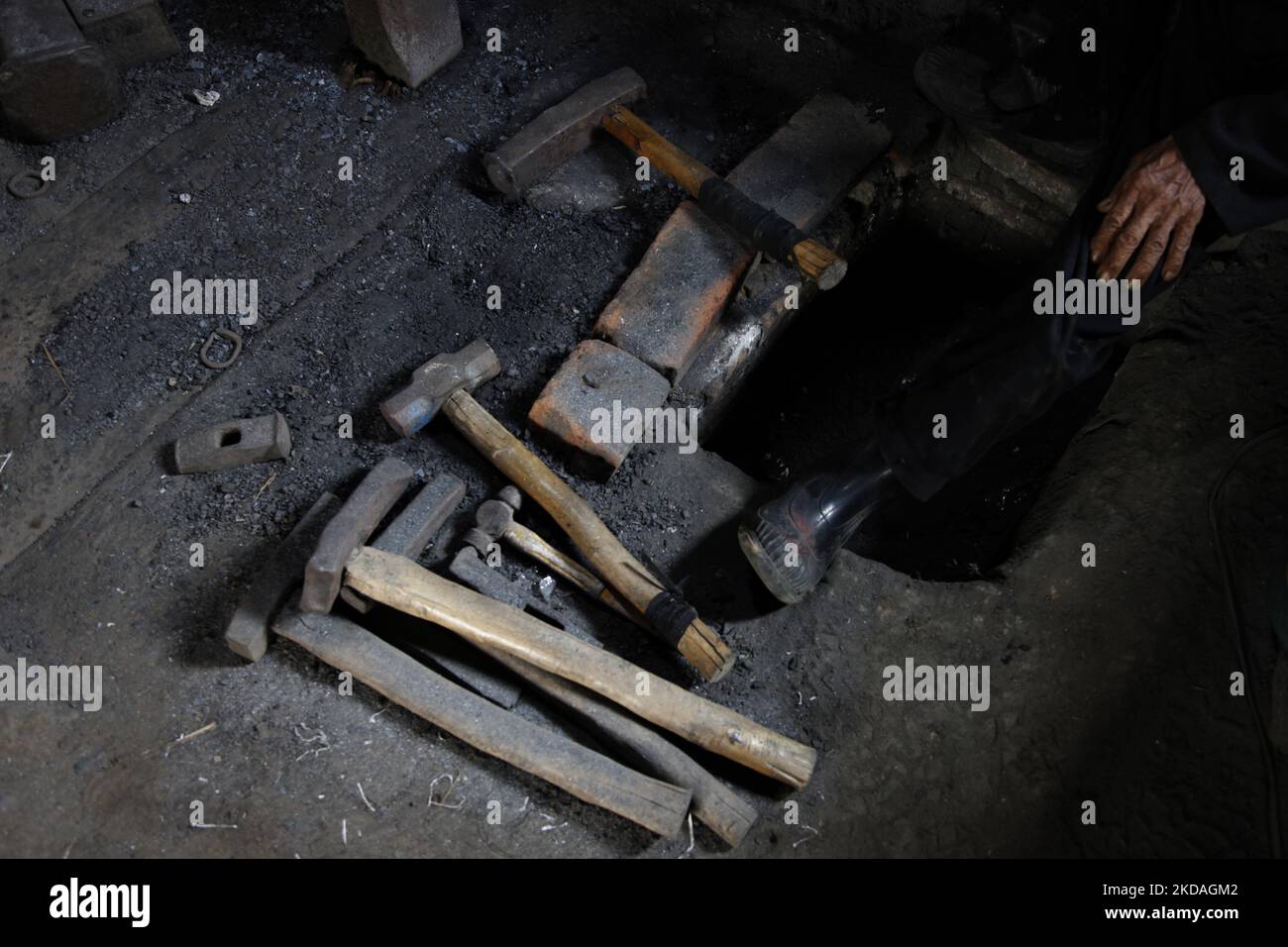 Supardi (71), assisting Ki Empu Sungkowo Hrumbrodjo (68), the 17th ...