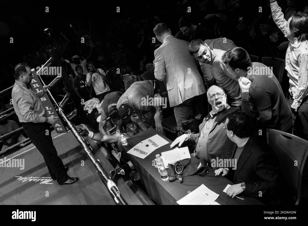 Carlos Black is knocked out of the ring moments before Vernon Webber ...