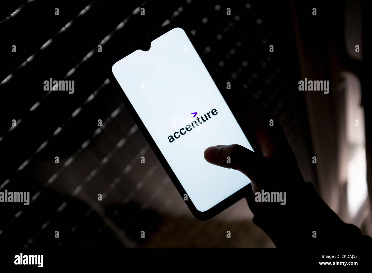 In this photo illustration an Accenture logo seen displayed on a ...