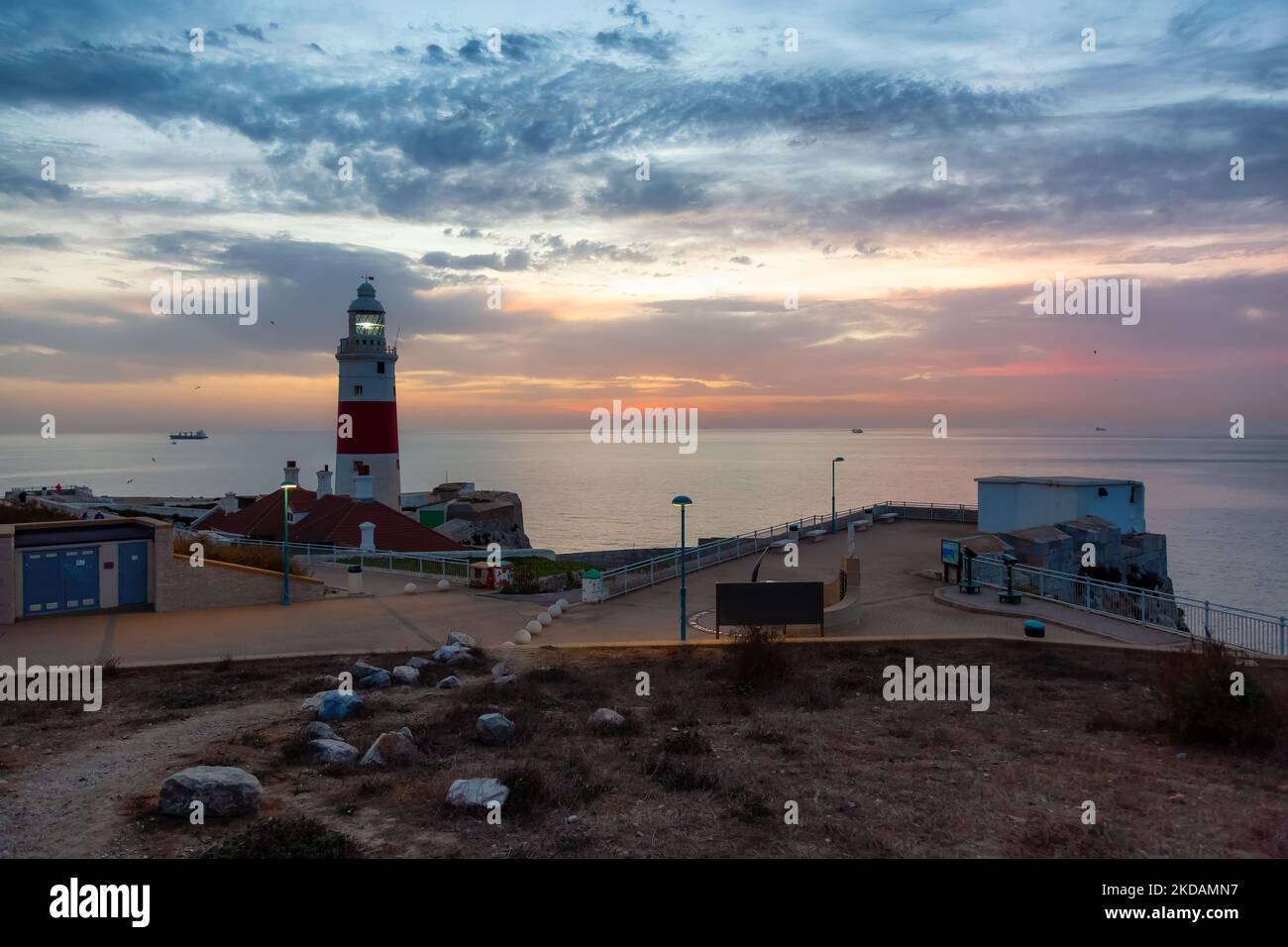 Europa Point Lighthouse with sea in background. Colorful Cloudy Sunrise ...