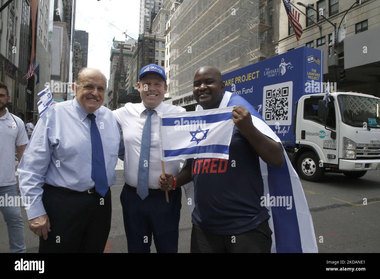 Rudi Giuliani, Andrew Giuliani and a demonstrator pose Demonstrators ...