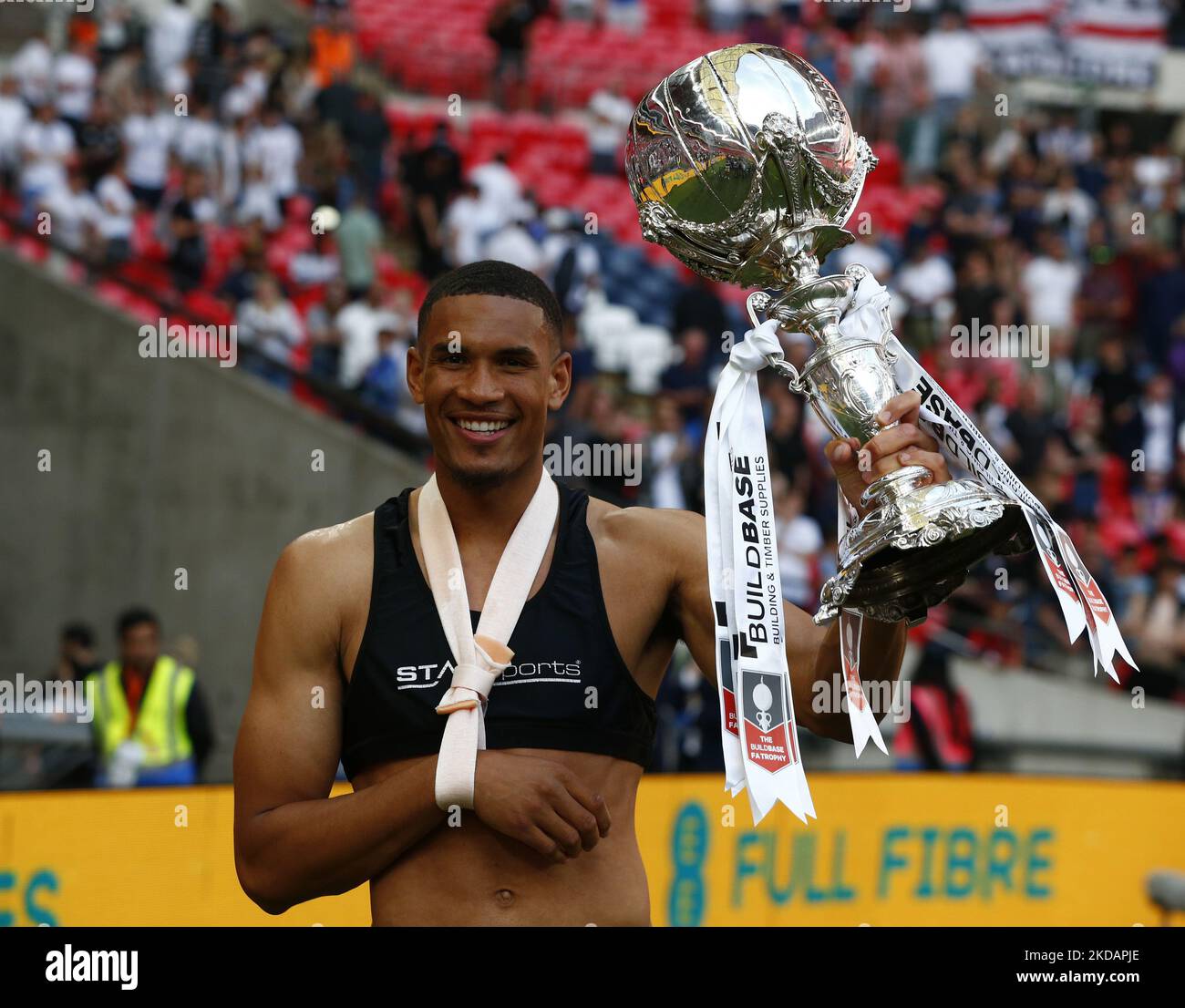 LONDON, ENGLAND - MAY 22: Omar Sowunmi of Bromley with FA Trophy after ...