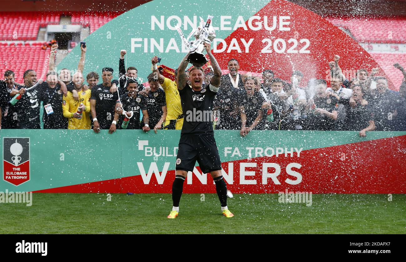 LONDON, ENGLAND - MAY 22: Byron Webster lift the FA Trophy after The ...