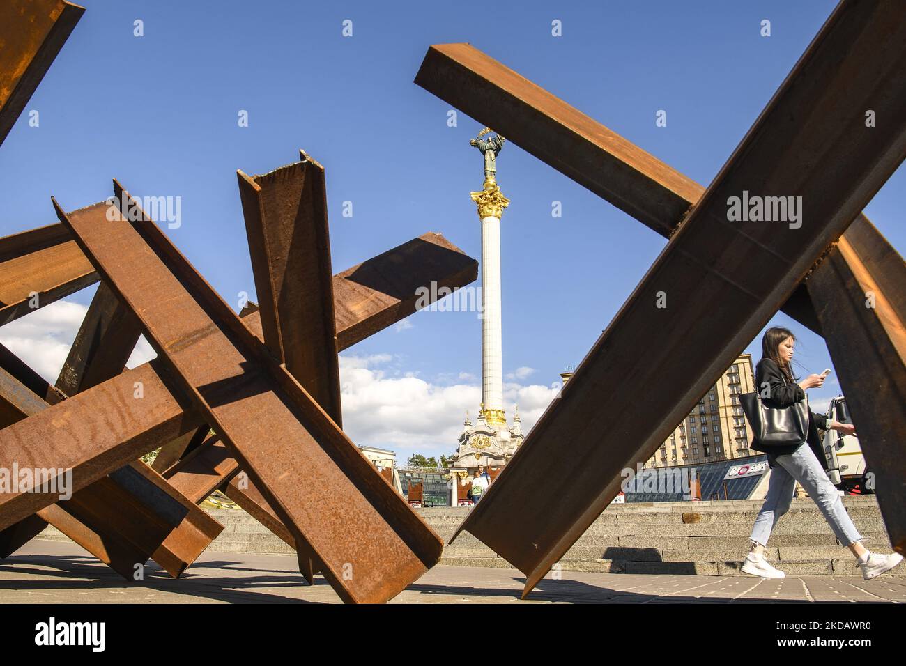 People pass close to anti-tank obstacle defense at the Independence ...