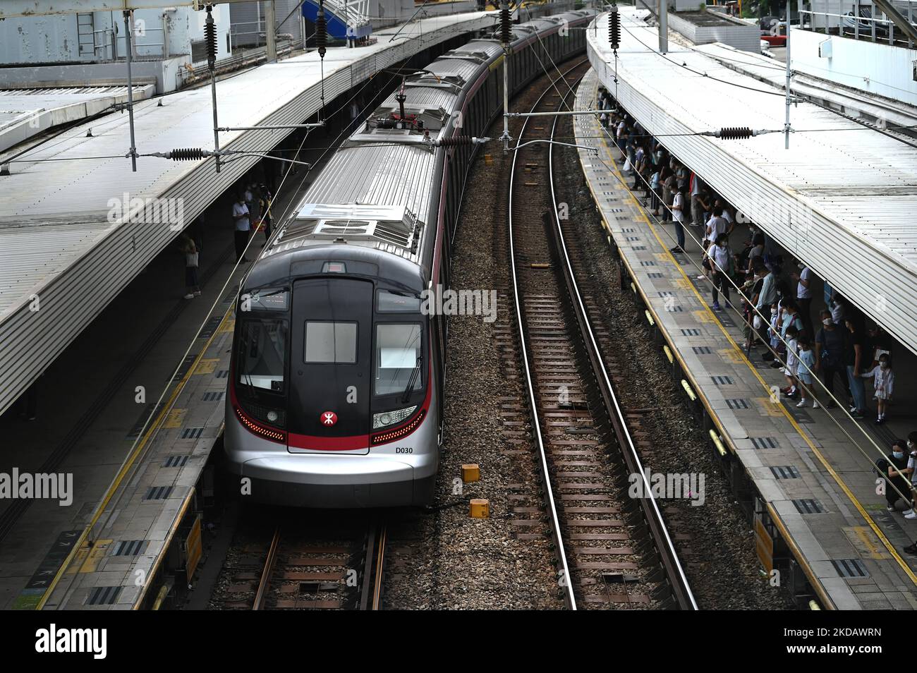 An MTR train departing a station on May 25 in Hong Kong, China. (Photo ...