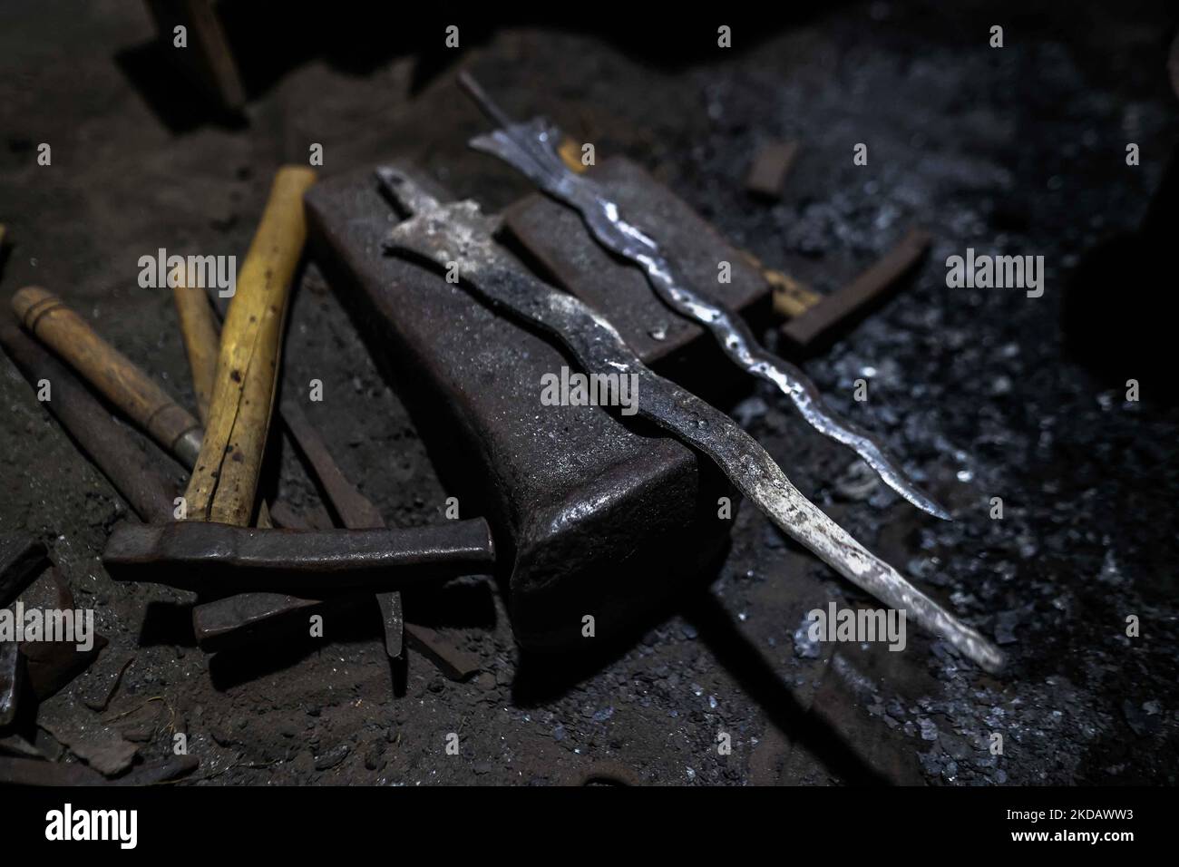 Javanese Keris dagger is seen at his workshop on May 20, 2022, in ...
