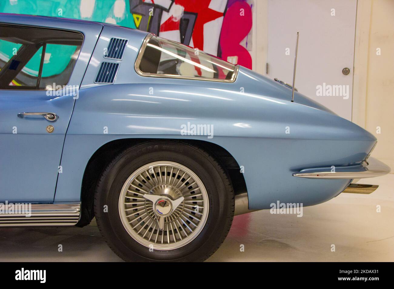 A closeup of details of the blue Chevrolet Corvette luxury car in the ...