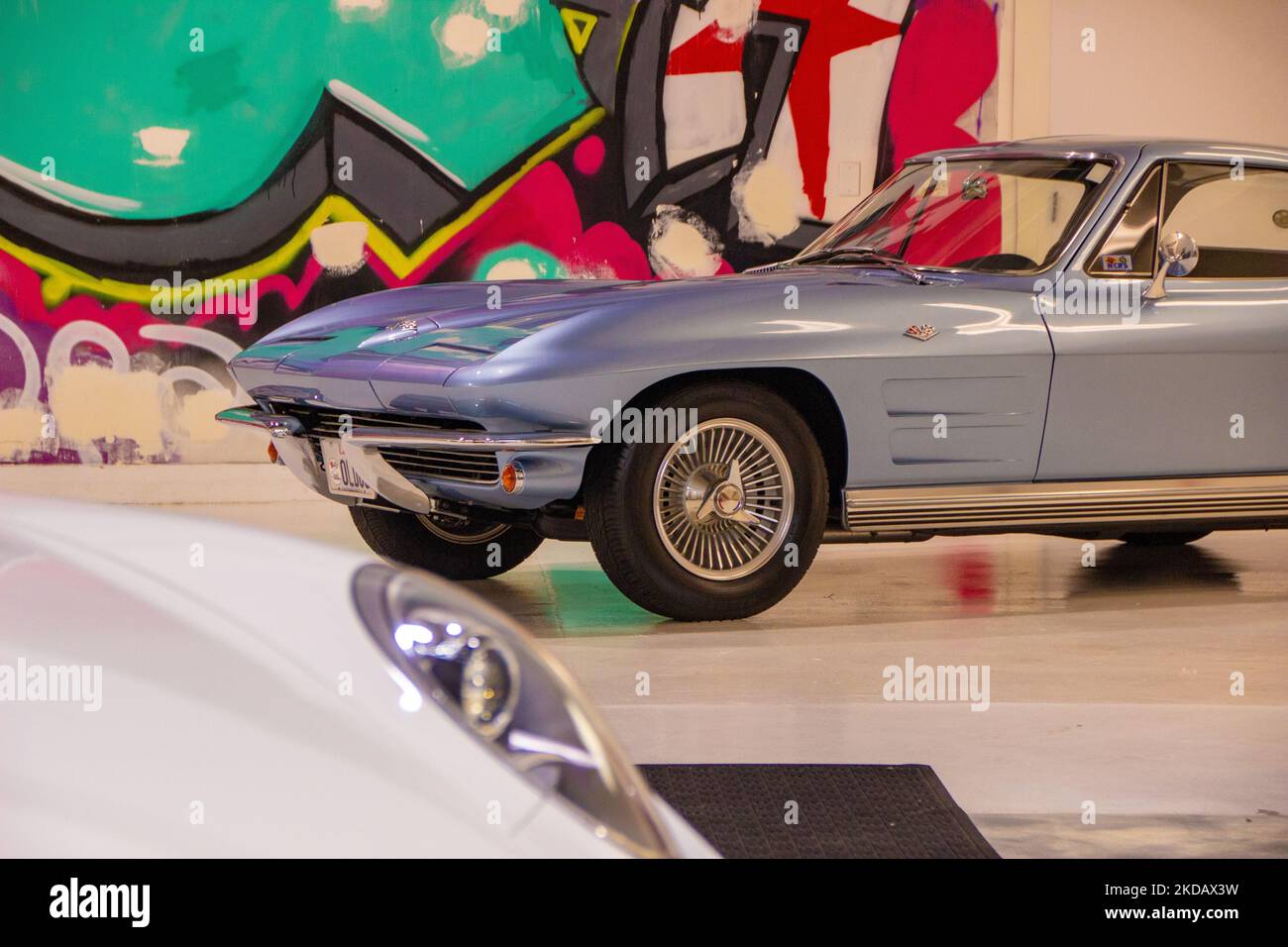 The blue Chevrolet Corvette luxury car in the auto detailing shop and ...