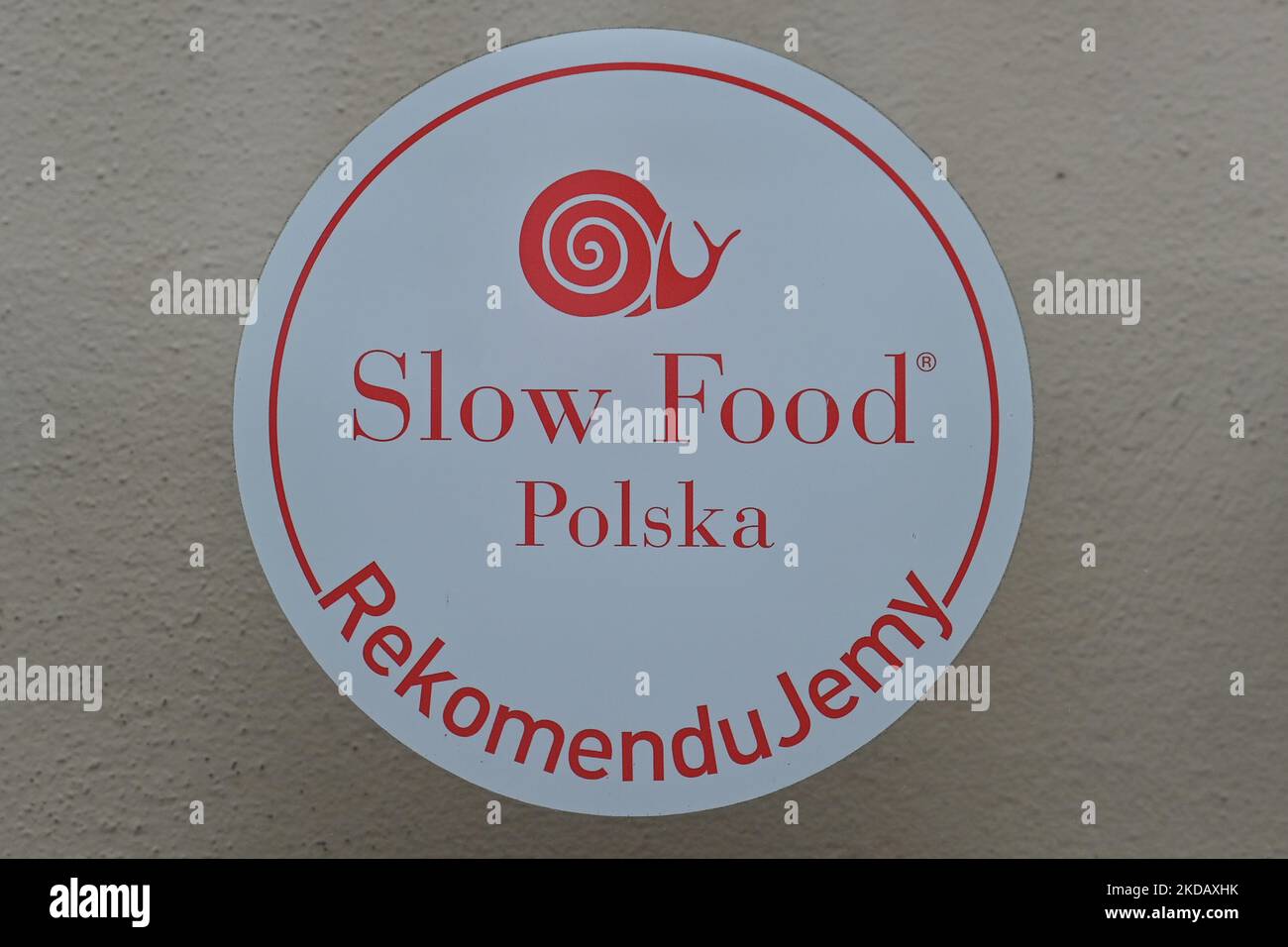 Slow Food logo outside a restaurant in Krakow-Kazimierz district. On ...