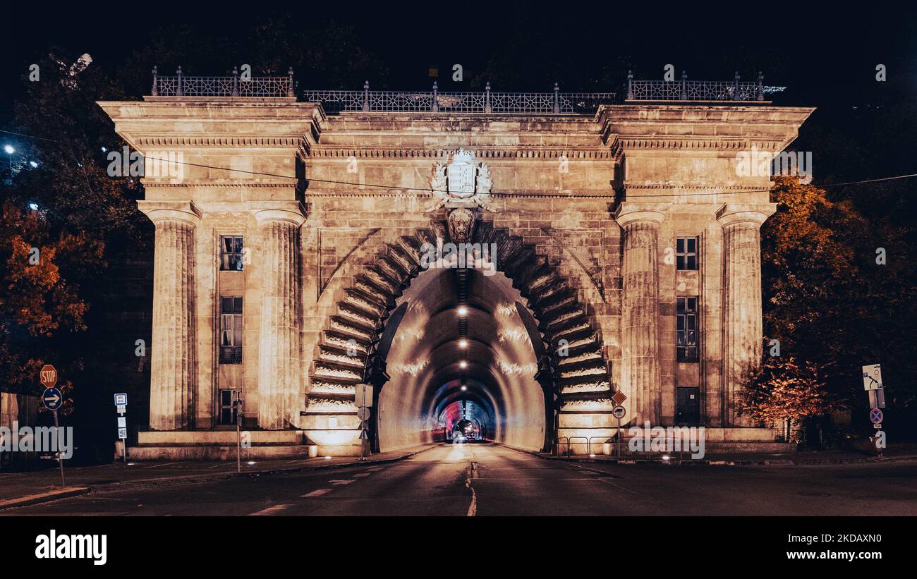 A scenic shot of the Buda Castle Tunnel in Hungary at night Stock Photo ...