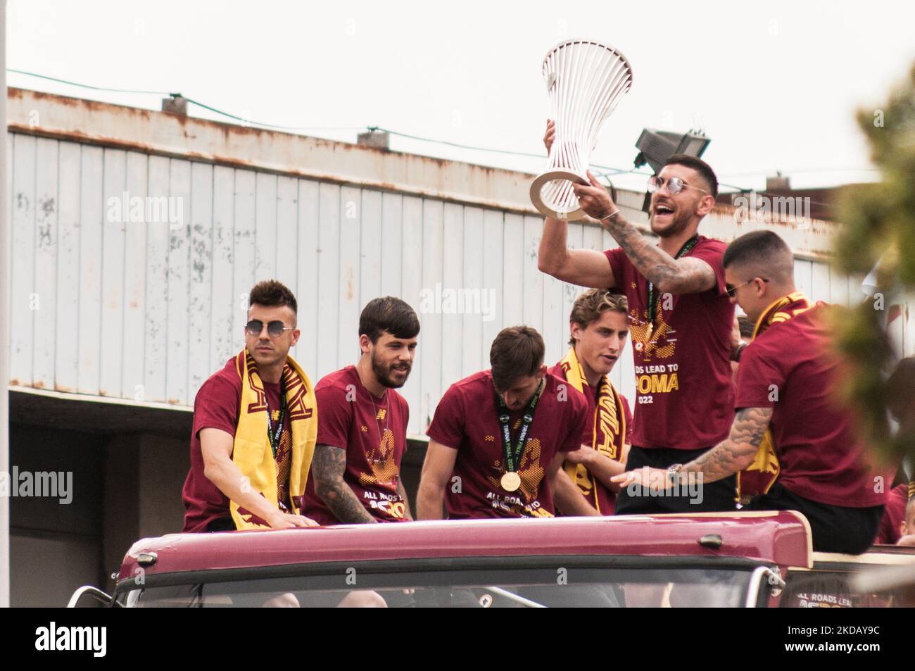 Two open-top As Roma coaches with the team and management on board left ...