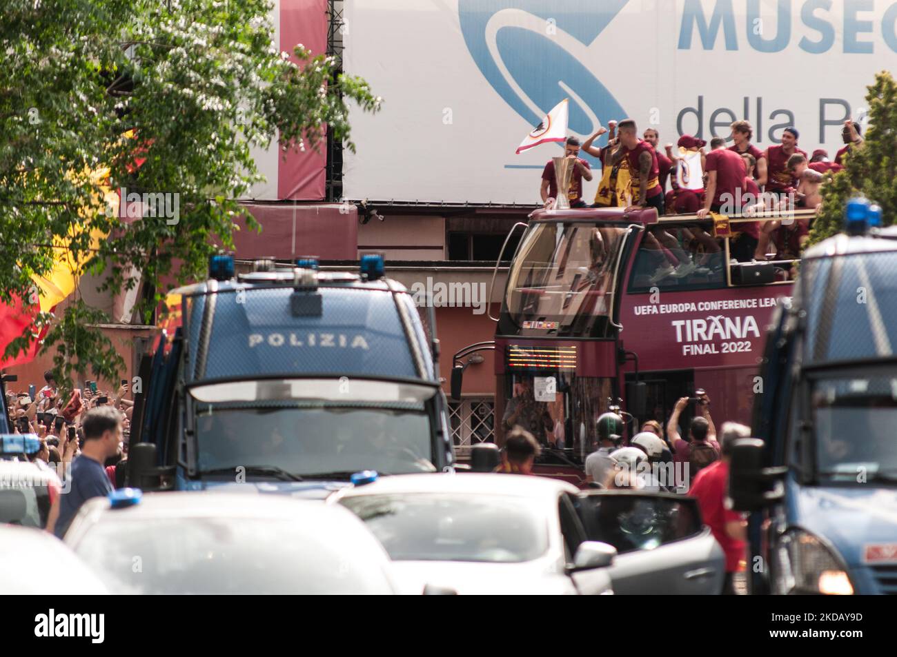 Two open-top As Roma coaches with the team and management on board left ...