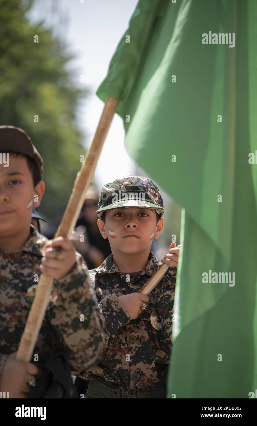 Two Iranian schoolboys wearing Islamic Revolutionary Guard Corps (IRGC ...