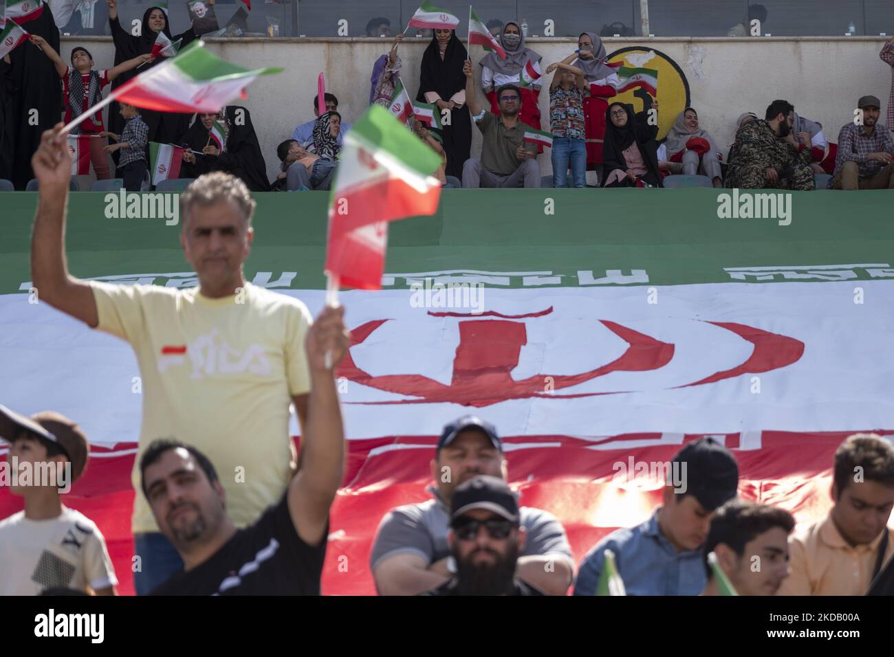Iranian supporters of Iran’s Supreme Leader Ayatollah Ali Khamenei wave ...