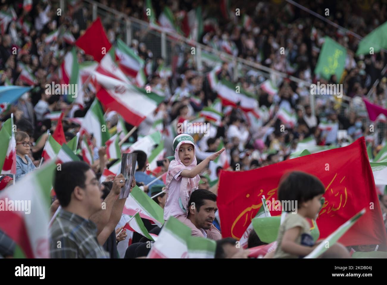 An Iranian schoolgirl gestures while chanting the Hymn Hello Commander ...