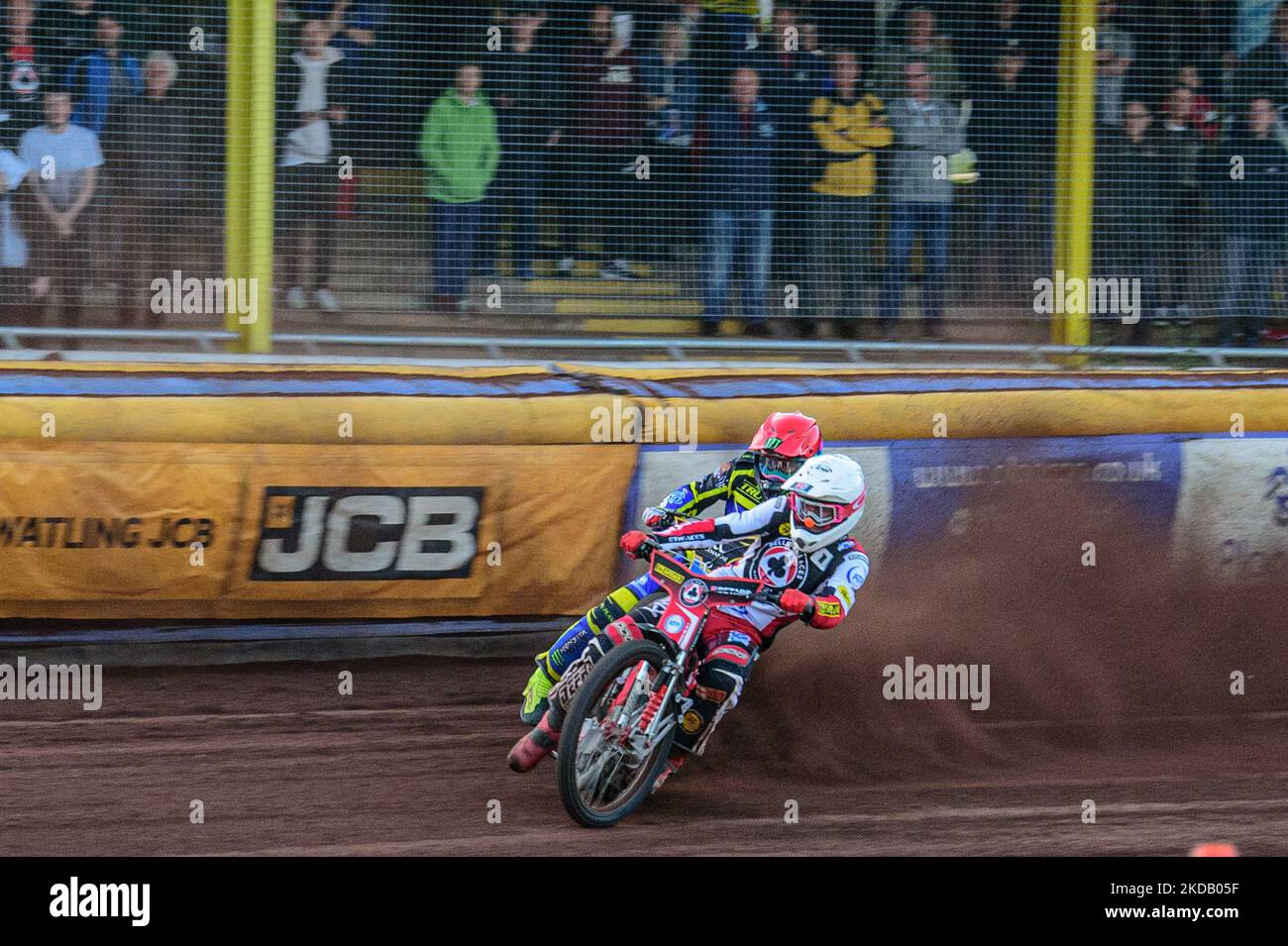 Max Fricke (White) passes Adam Ellis (Red) during the SGB Premiership ...