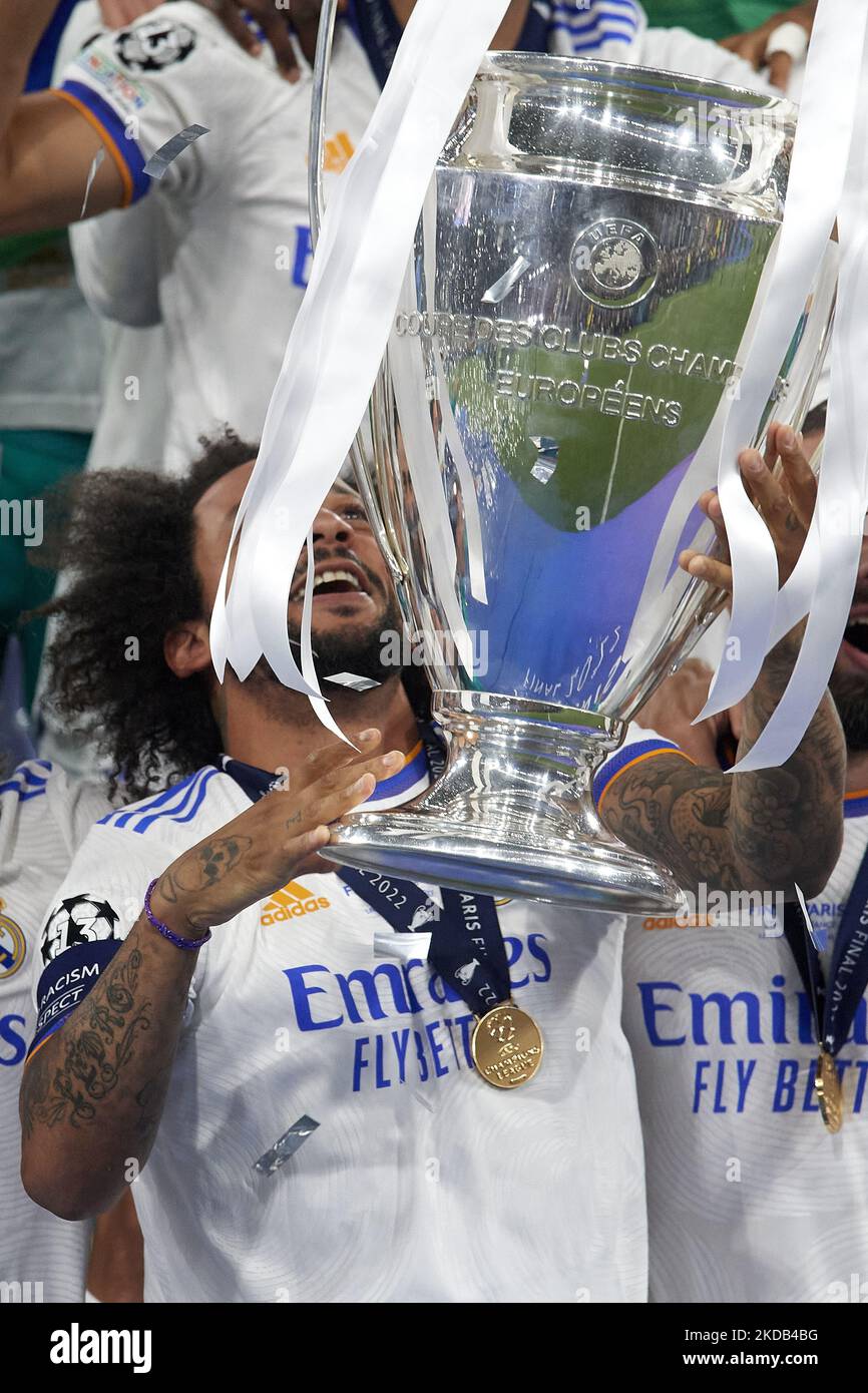 Marcelo of Real Madrid lifts the trophy after winning with his team the ...