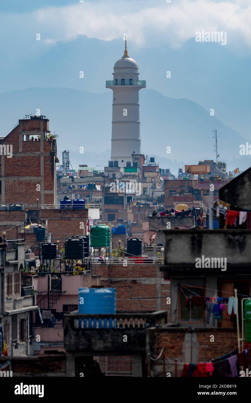 A vertical city view including the White Tower of Durbar Square in ...