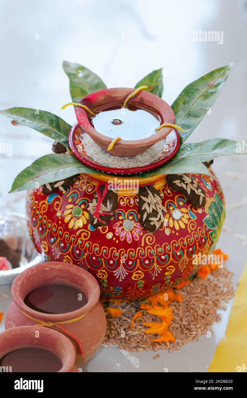 A Matka pot decorated with flowers and gems for Indian wedding Stock ...