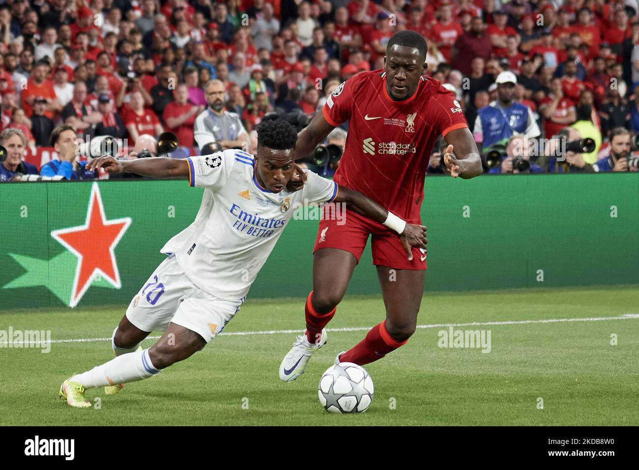 Ibrahima Konate of Liverpool and Vinicius Junior of Real Madrid compete ...