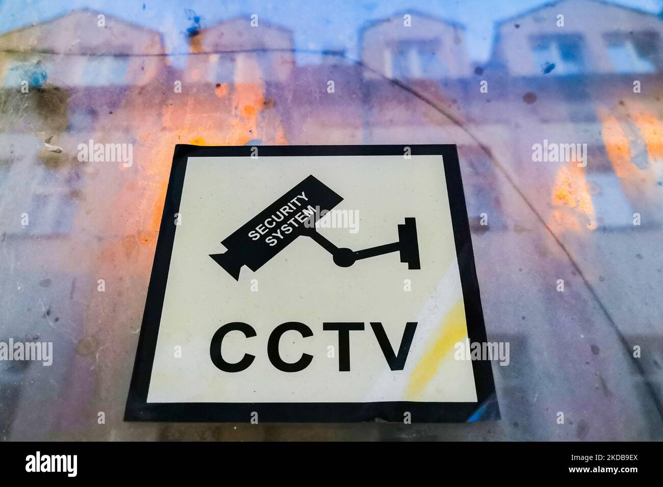 CCTV video surveillance recording sign is seen on a building in Krakow ...