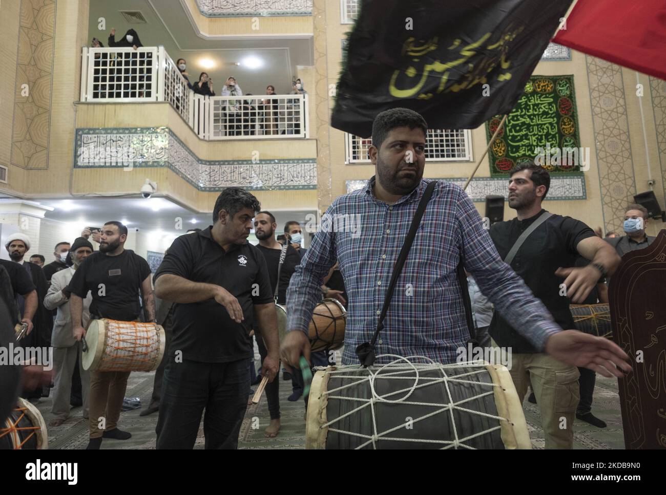 Iranian men play traditional musical instruments while taking part a ...