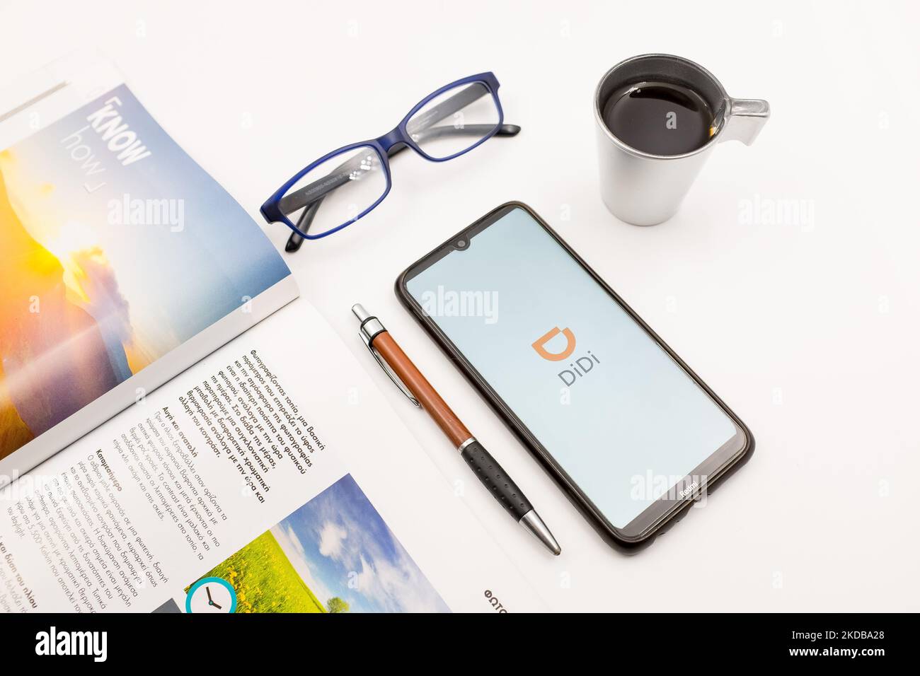 In this photo illustration a DiDi logo seen displayed on a smartphone ...