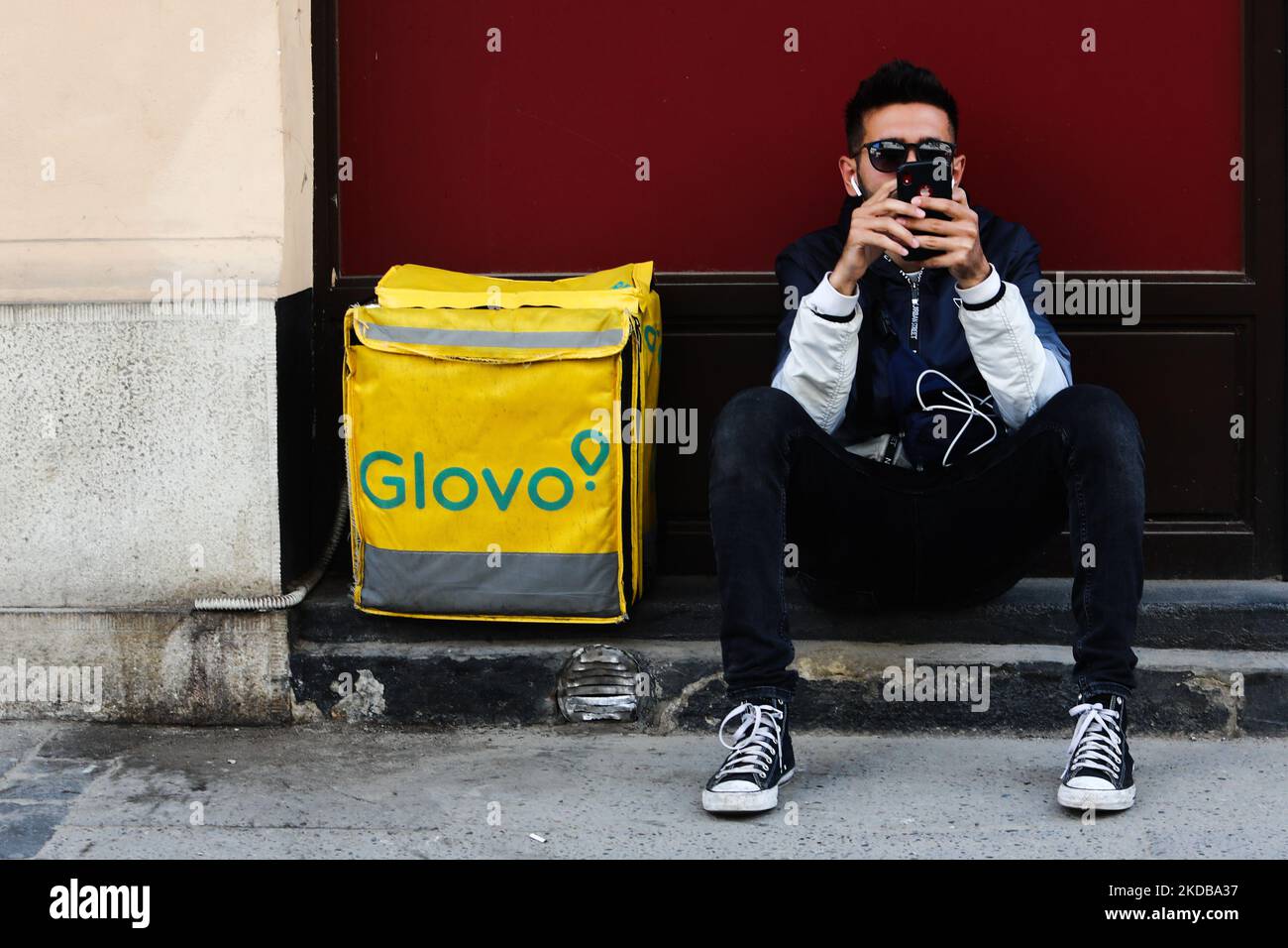 Glovo logo is seen on a courier's bag in Krakow, Poland, on May 30 ...