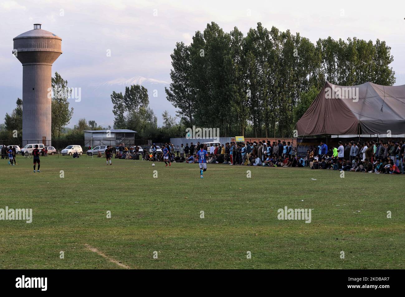 People watch as Kashmiri Boys play Football in Sopore District ...