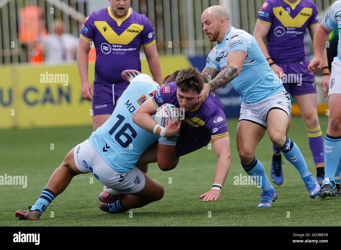 Junior Moors of Featherstone Rovers tackles Isaac Nokes of Newcastle ...