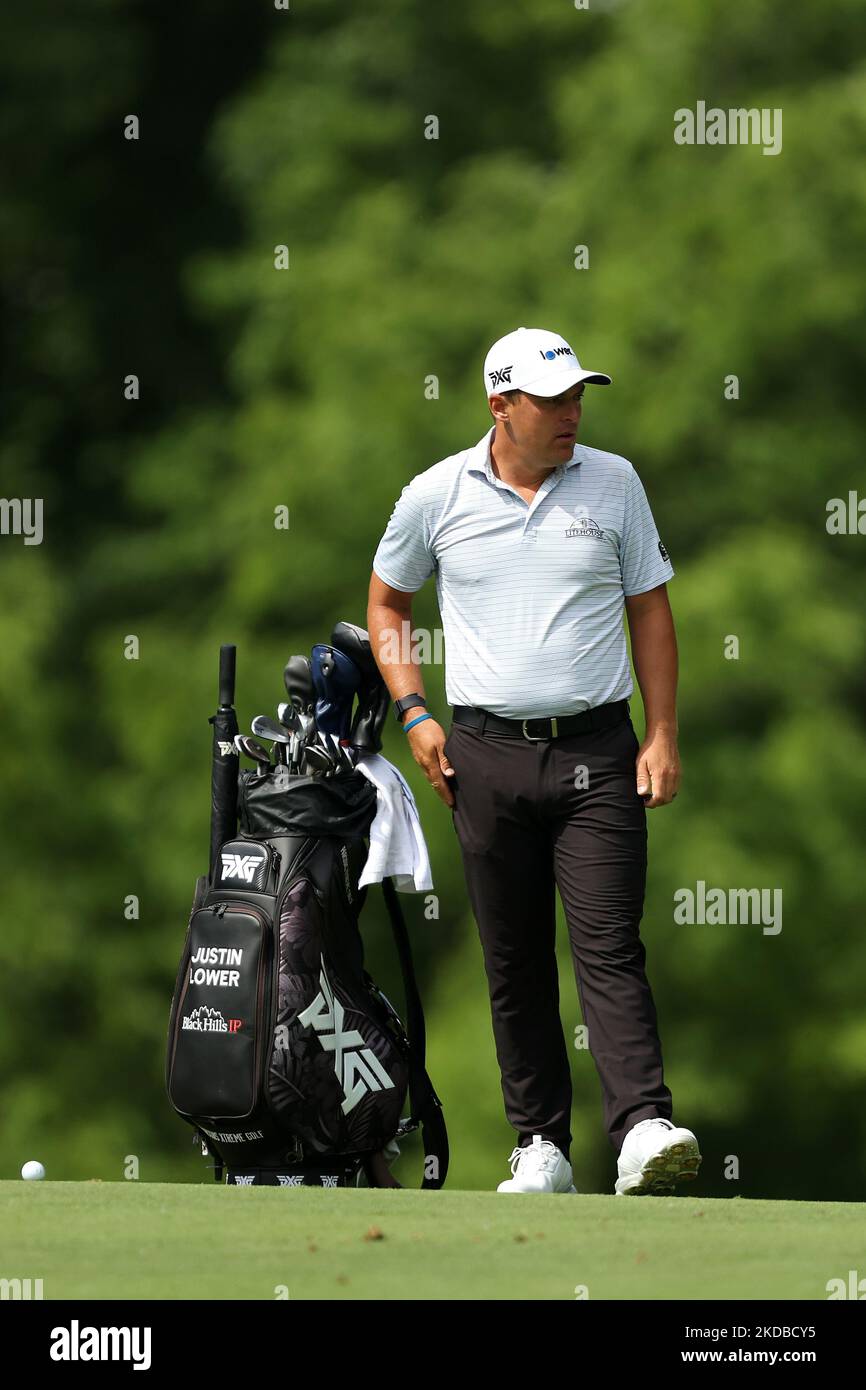Justin Lower of the USA waits on the 9th hole during the first round of ...