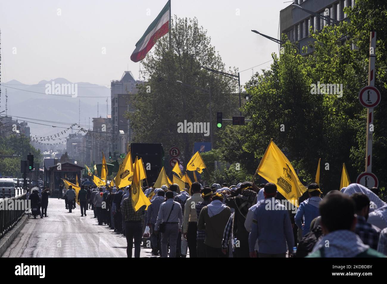 Iranian Basiji (Members of Basij Paramilitary force) men carrying ...