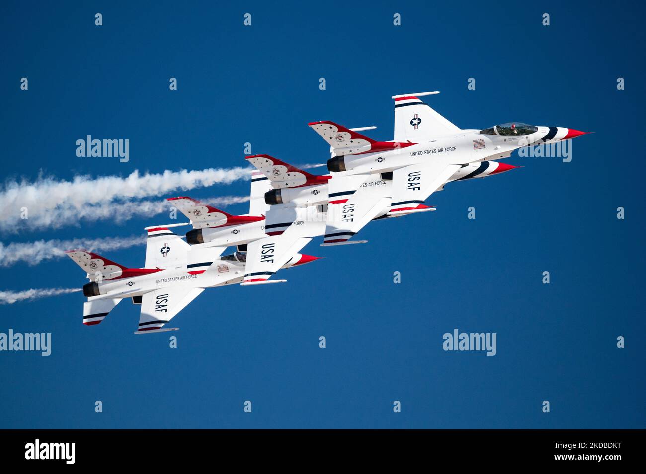 Four F-16 Fighting Falcon fighter jets assigned to the U.S. Air Force ...