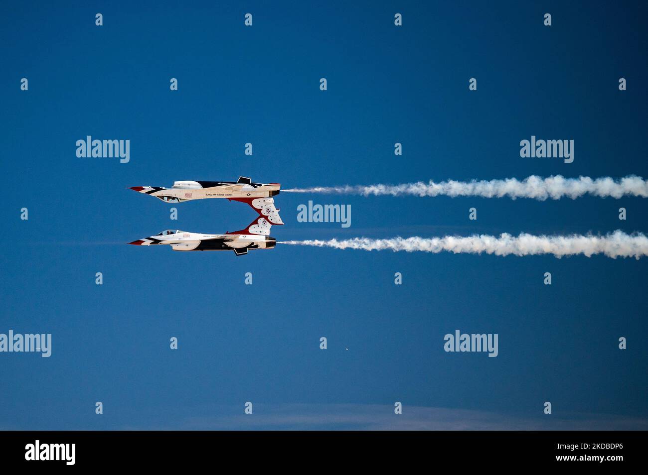 Two F-16 Fighting Falcon fighter jets assigned to the U.S. Air Force ...